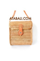 ata bucket bag with long leather strap and rattan cross clip