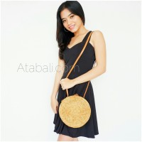 ata bucket bag with long leather strap and rattan cross clip